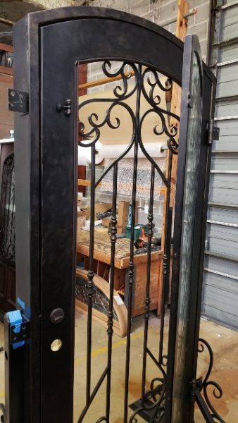 Check Out Our Iron Doors with Operable Glass Panels - Southern Front Door